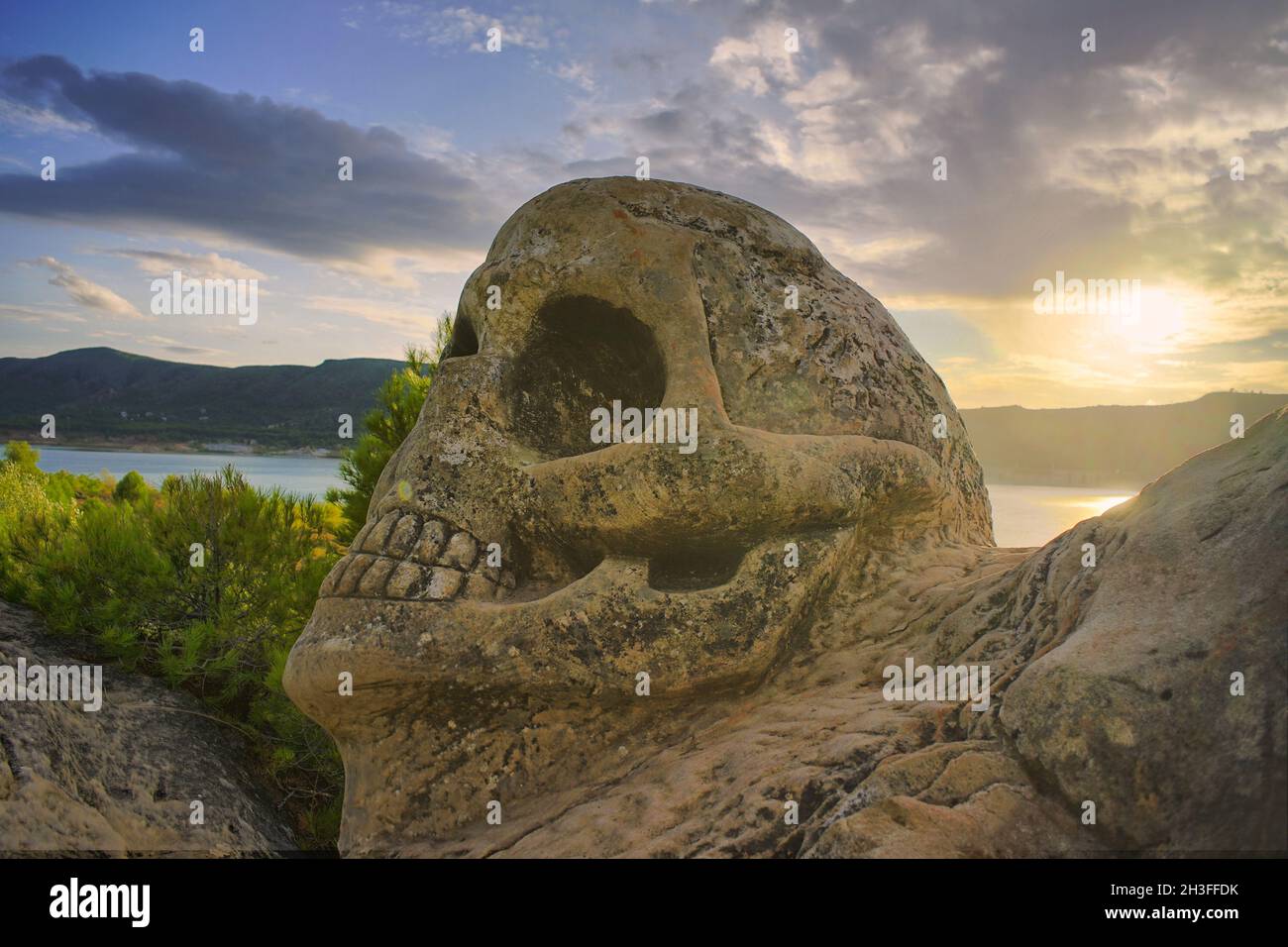 Sculpture of a skeleton in Route of the Faces in Spain Stock Photo - Alamy
