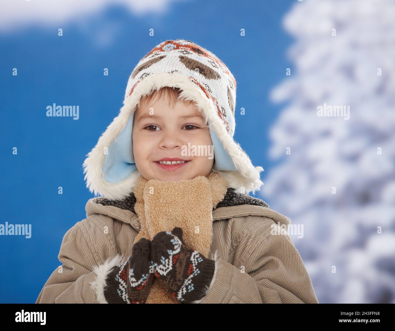 Happy kid at winter Stock Photo - Alamy