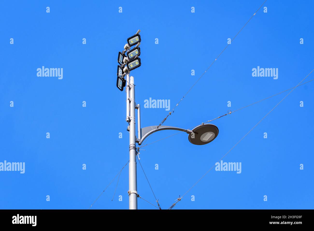 Modern economic lighting pole with clear blue sky in the background in ...