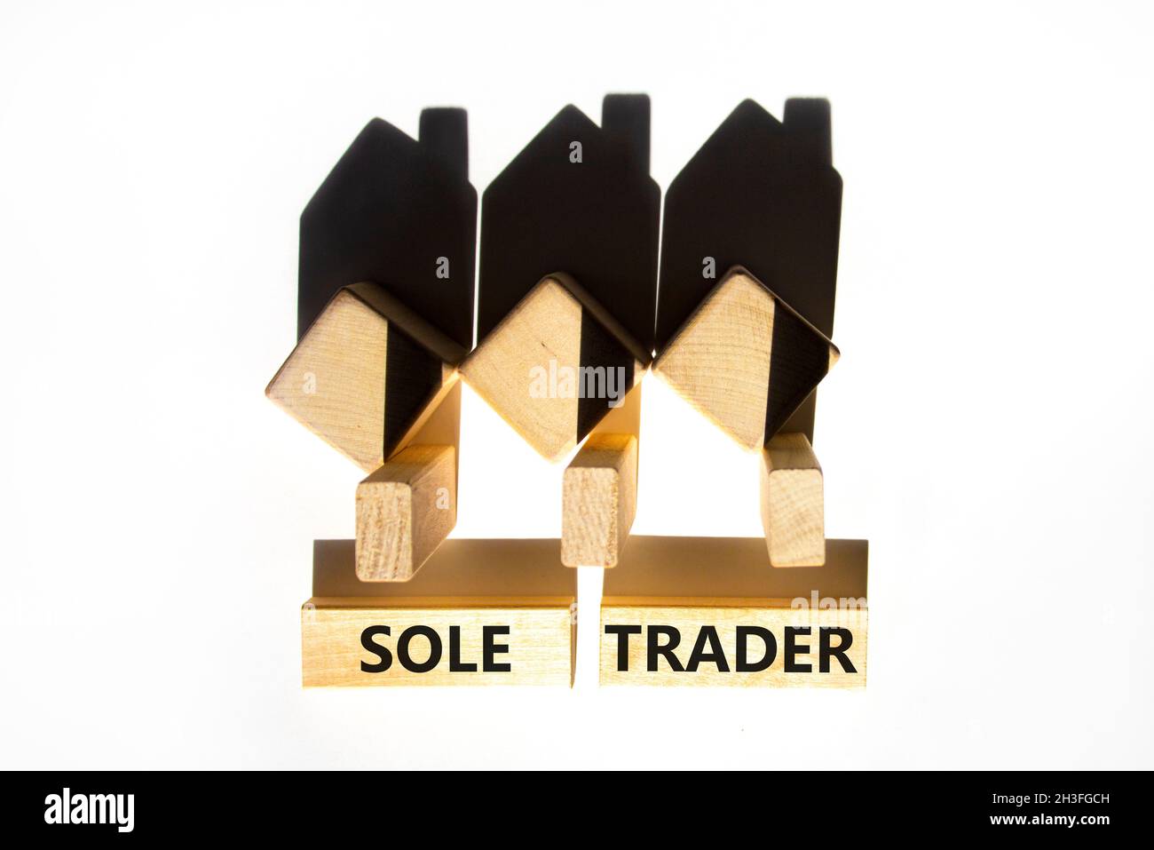 Sole trader symbol. Concept words 'Sole trader' on wooden blocks near ...