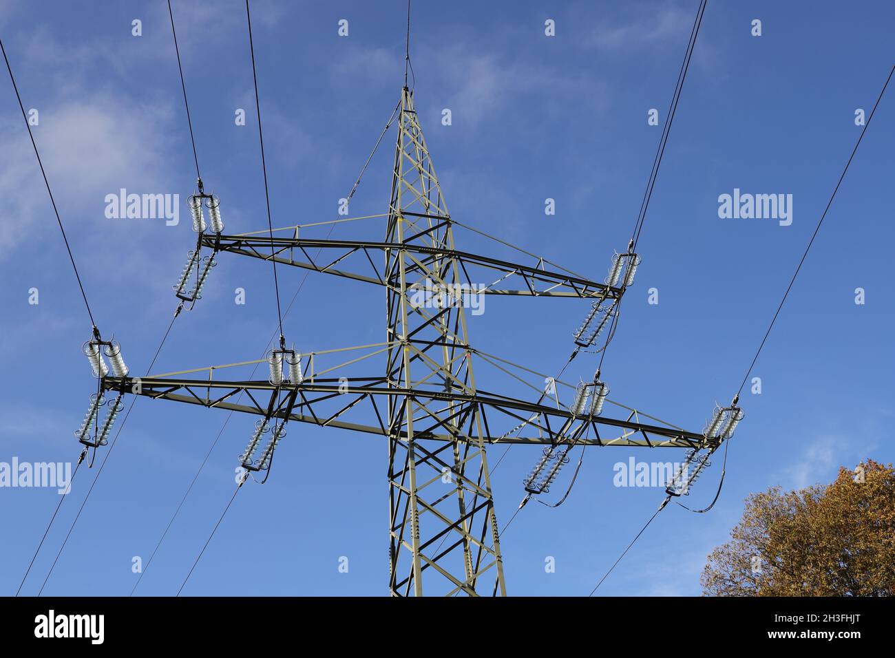 Electricity pylon with blue sky Stock Photo - Alamy