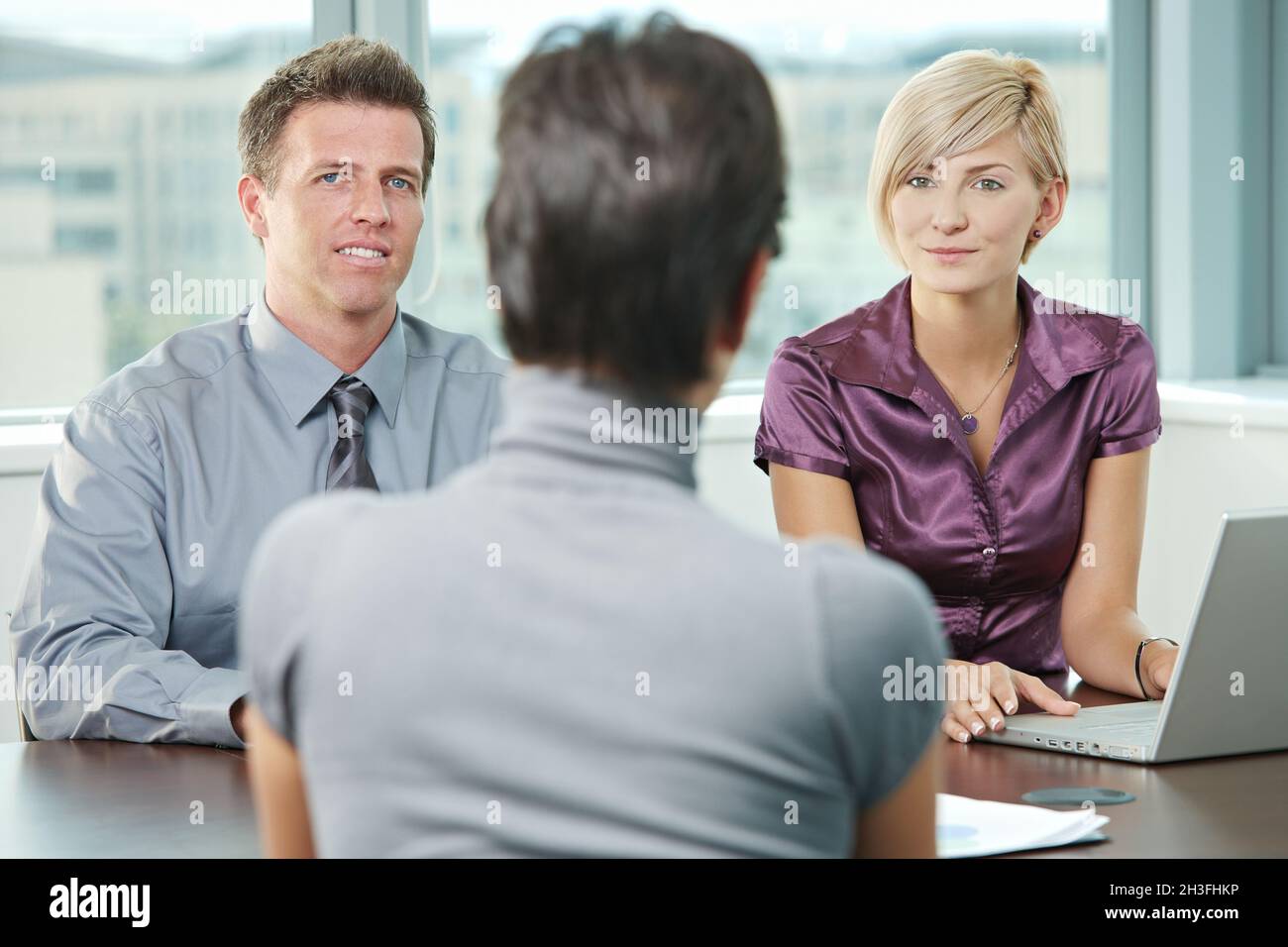 Business people talking Stock Photo - Alamy