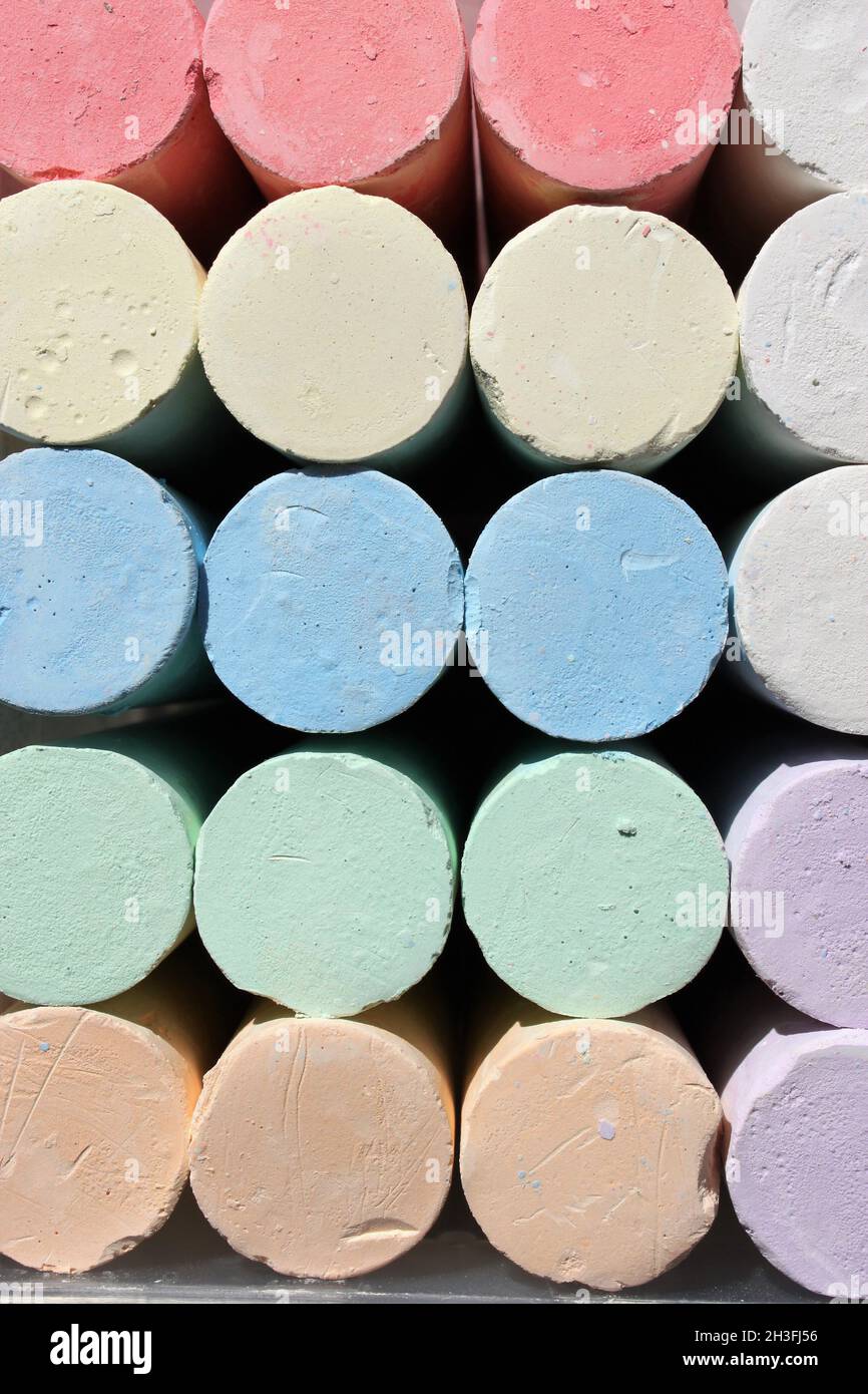 colorful round street crayon in a box assorted colors seen from above ...