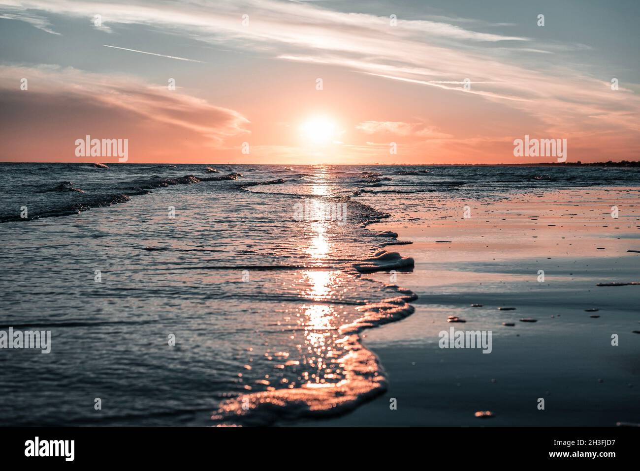 Amazing sunset in Italy, Bibione, at the sea with amazing light and ...