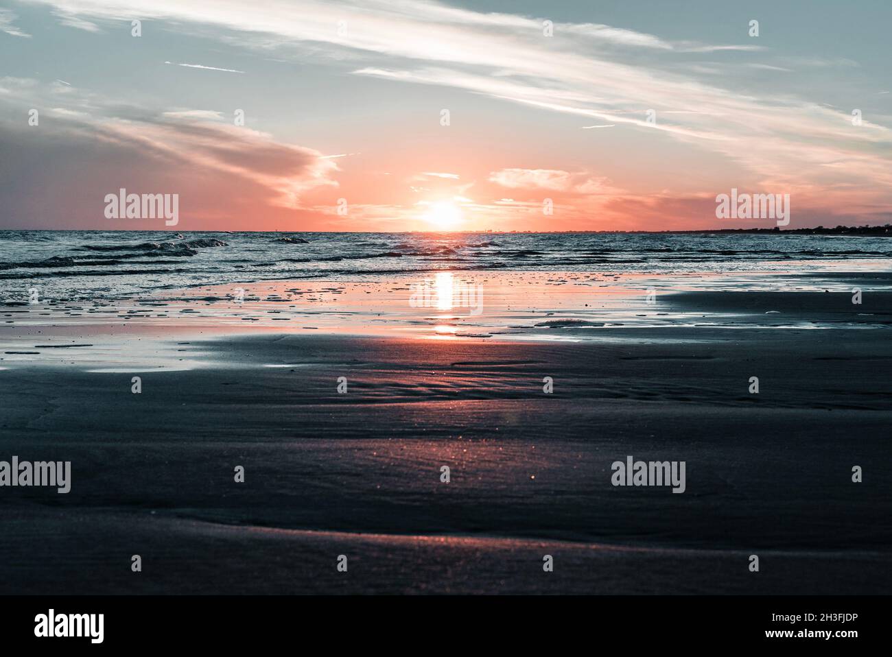 Amazing sunset in Italy, Bibione, at the sea with amazing light and ...