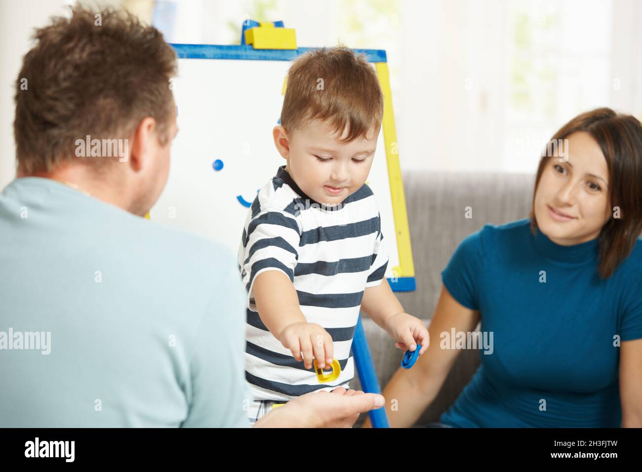 Little boy learning letters and numbers Stock Photo - Alamy