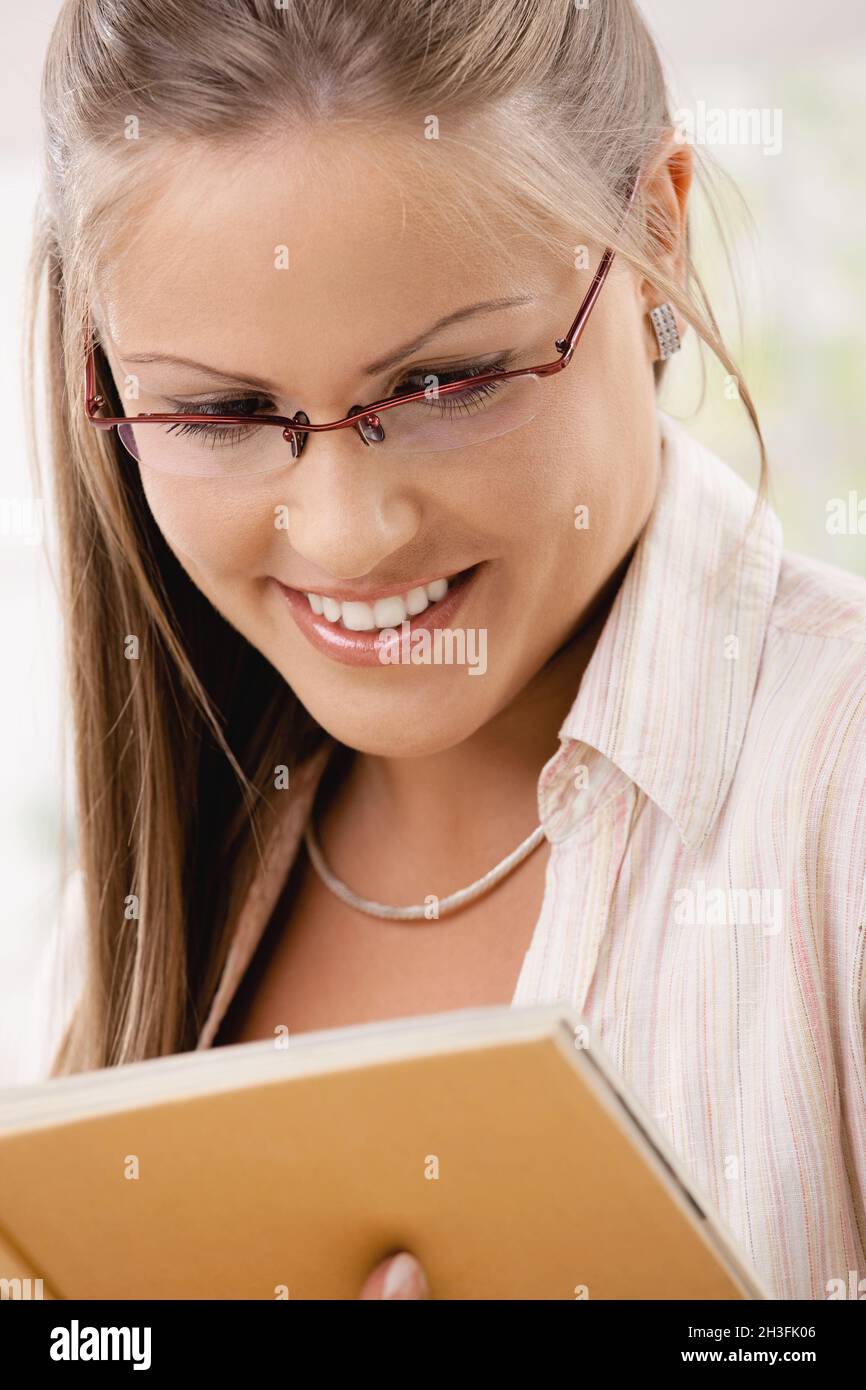 Beautiful girl reading book Stock Photo - Alamy