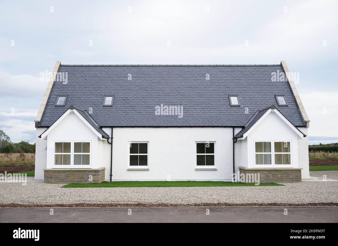 Luxury new house being built in rural countryside Stock Photo - Alamy