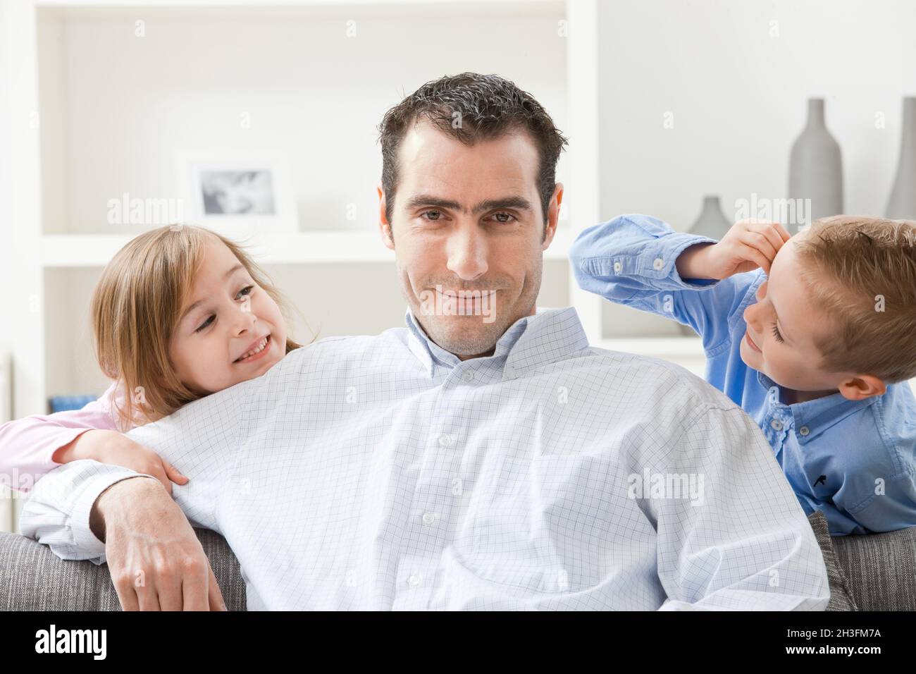 Father and children Stock Photo - Alamy