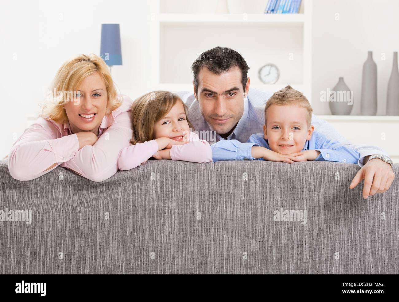 Couple with two children Stock Photo - Alamy