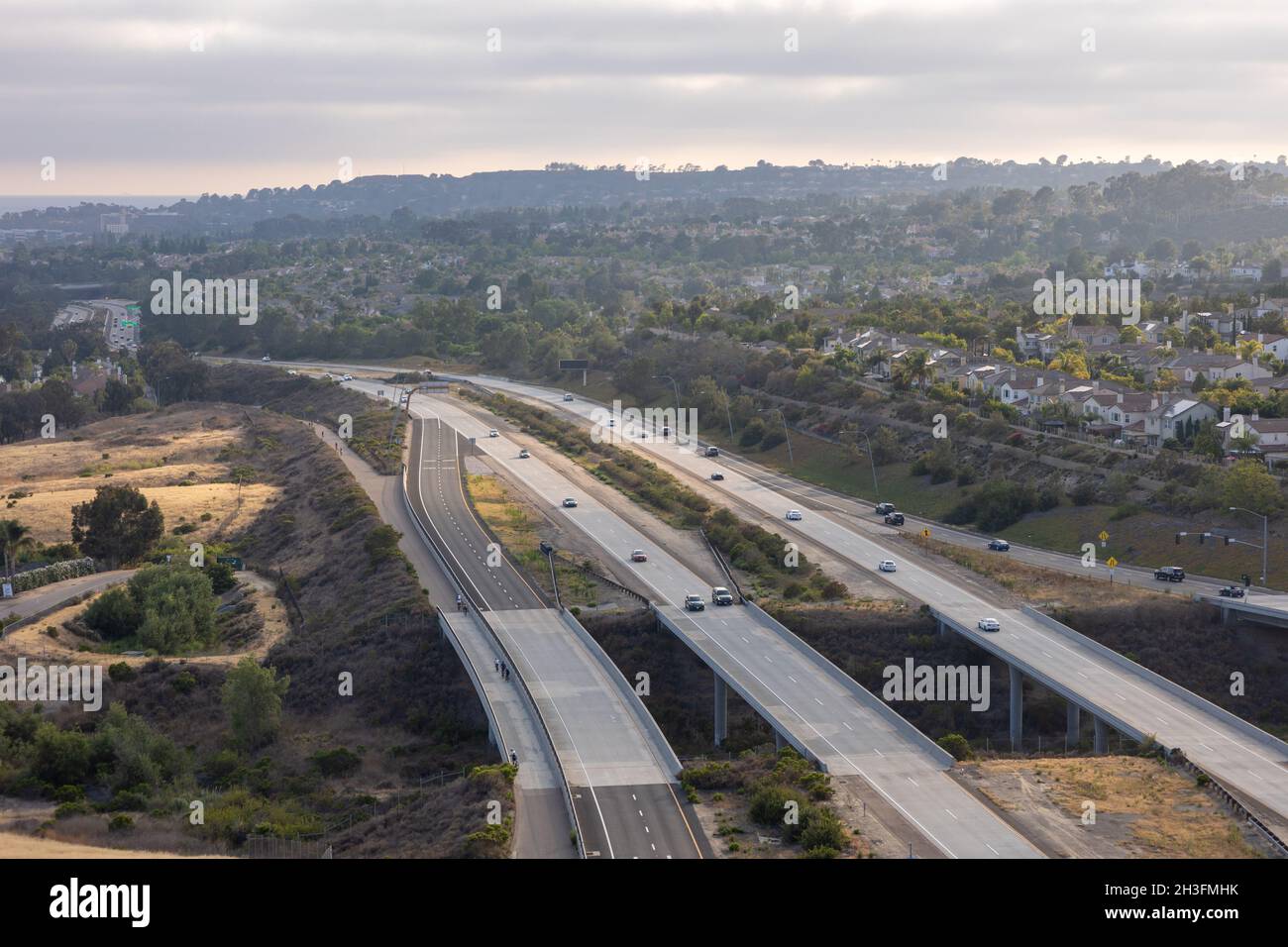 Aerial view of highway, freeway road with vehicle in movement before ...