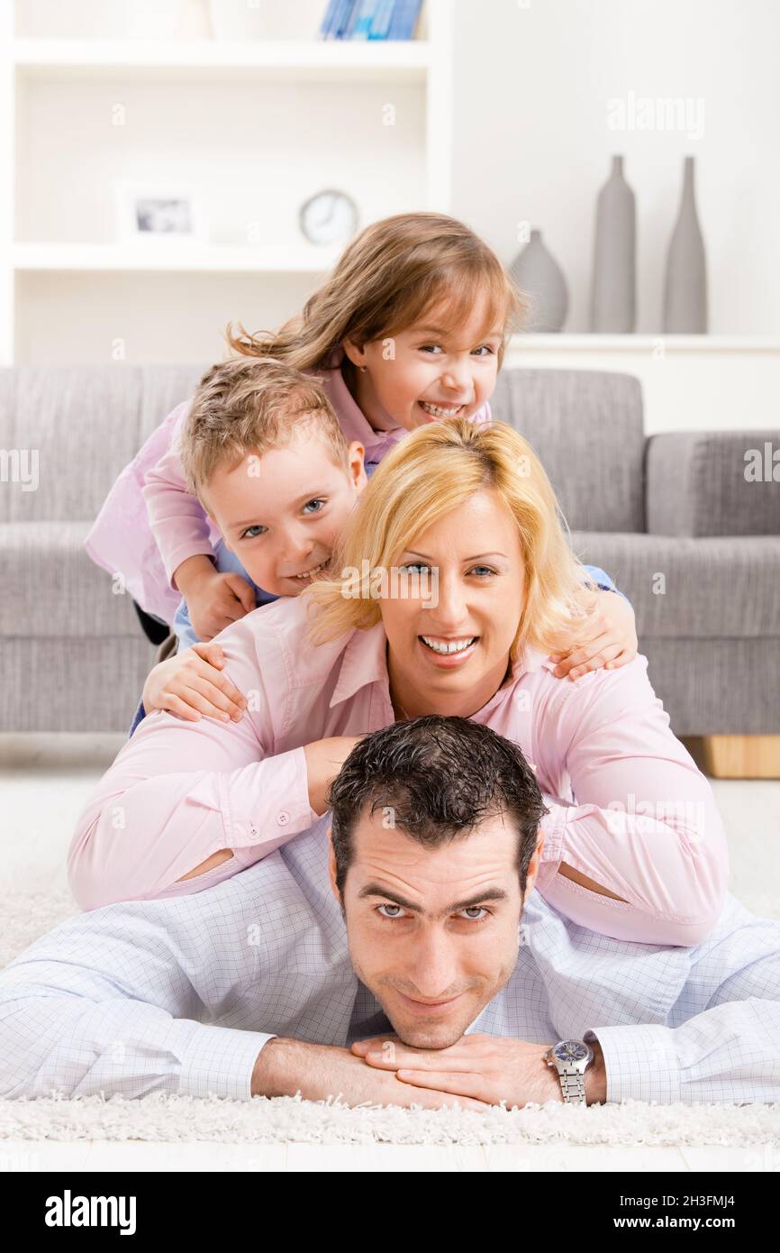 Family heap at home Stock Photo - Alamy