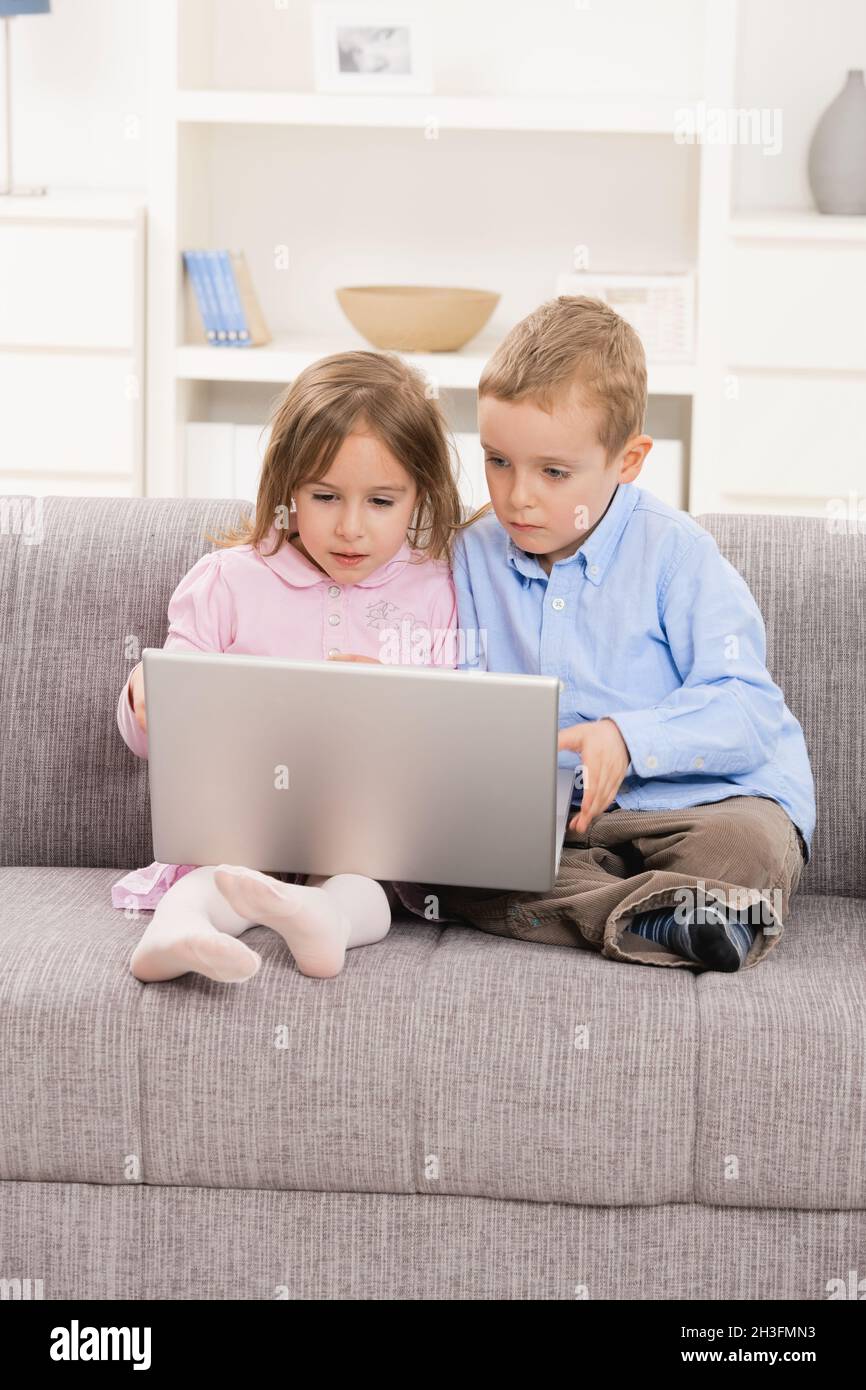 Children using laptop computer Stock Photo - Alamy
