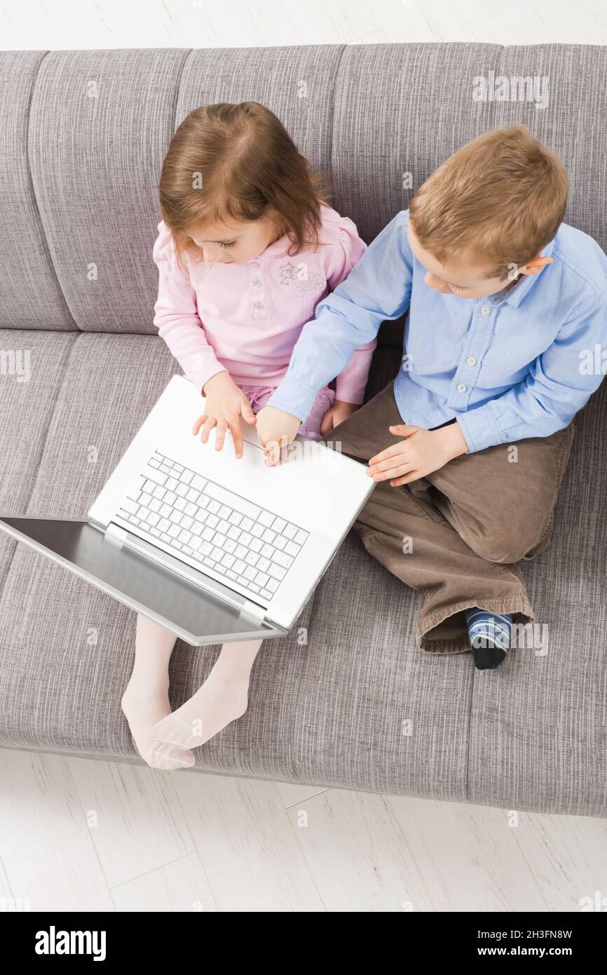 Children using laptop computer Stock Photo - Alamy
