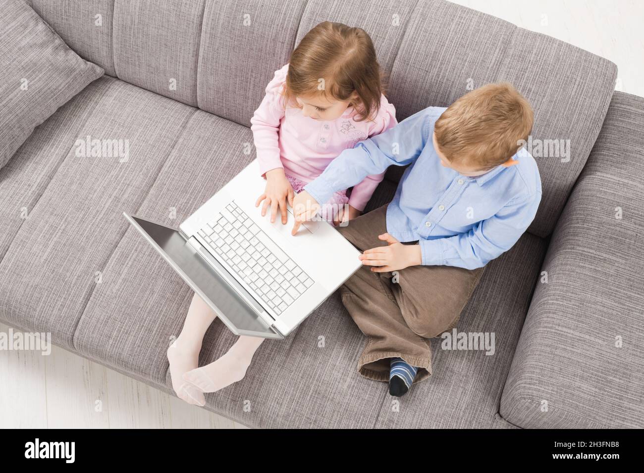 Children with laptop computer Stock Photo - Alamy