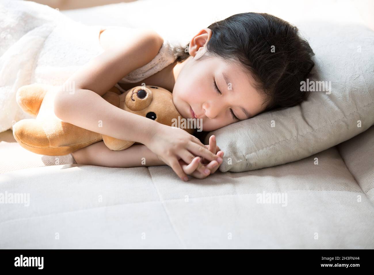 Lovely and beautiful little girl sleeping Stock Photo - Alamy