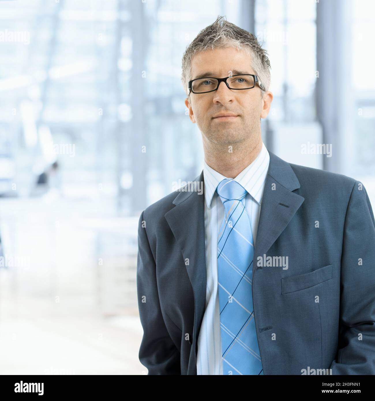 Businessman square hi-res stock photography and images - Alamy