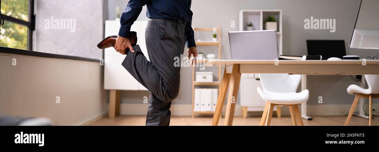 Standing Office Yoga Workout And Workout Near Business Computer Stock ...