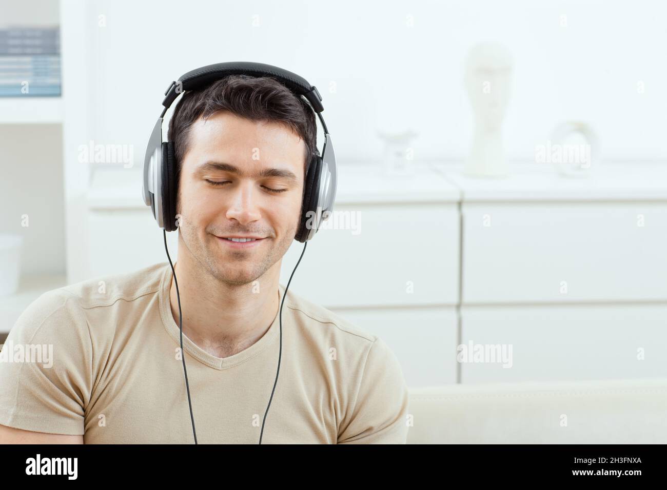 Man with headphones Stock Photo - Alamy