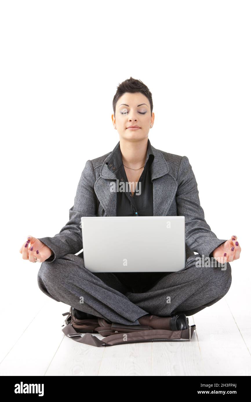 Seated in lotus position hi-res stock photography and images - Alamy