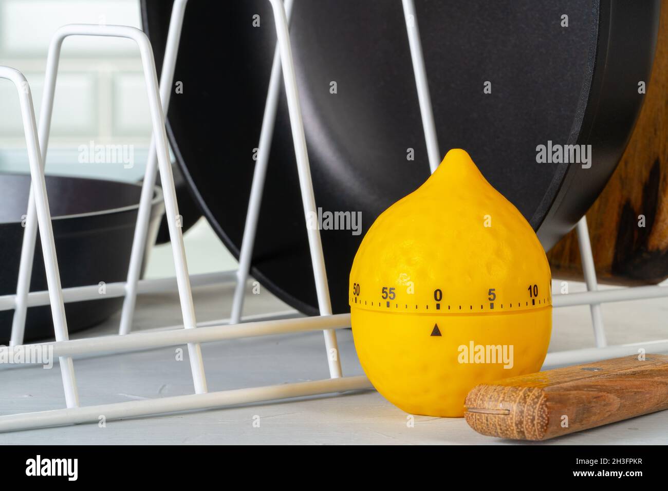 Clean and dry cooking pans on a kitchen counter Stock Photo - Alamy