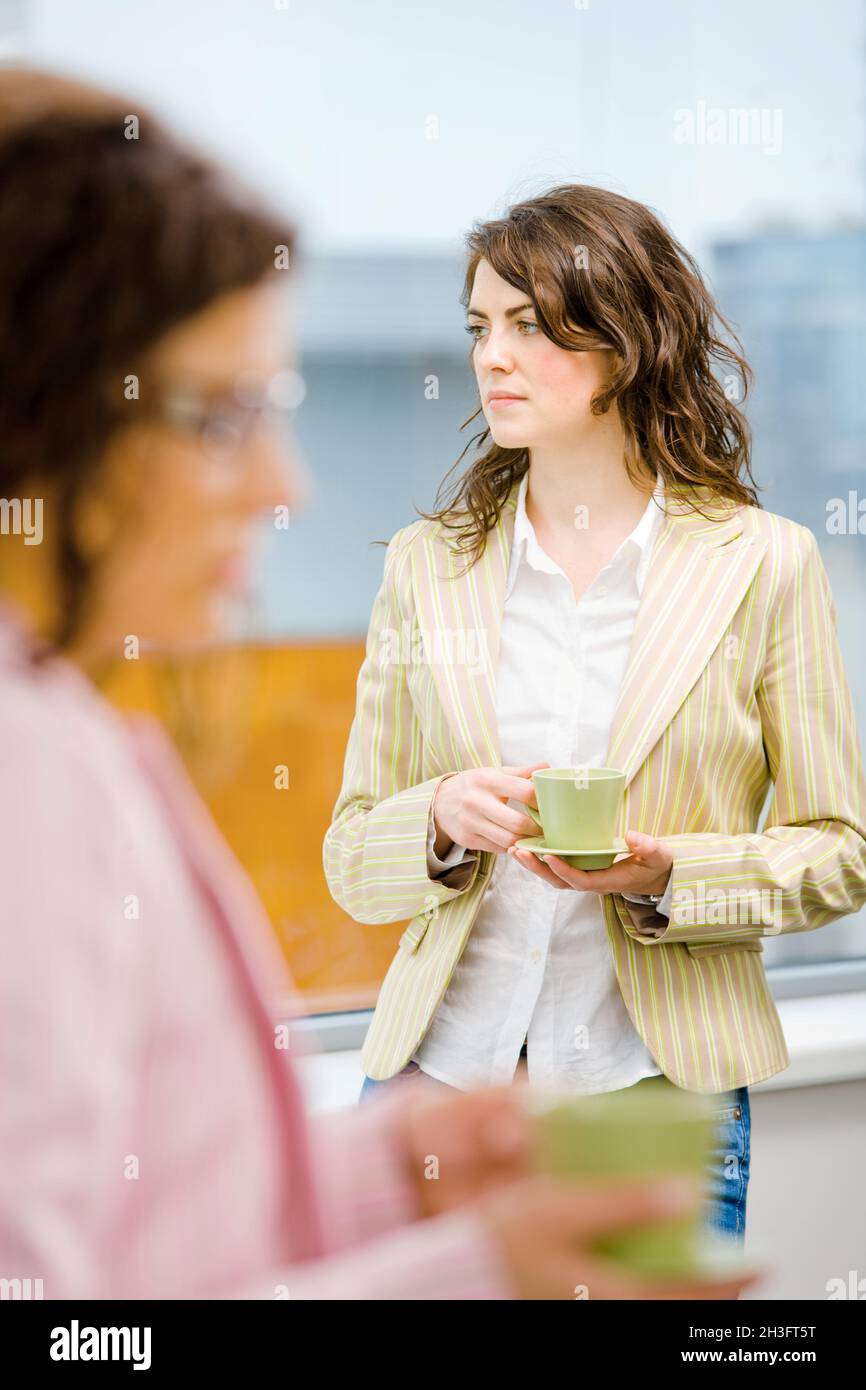 Office workers drink coffee Stock Photo - Alamy