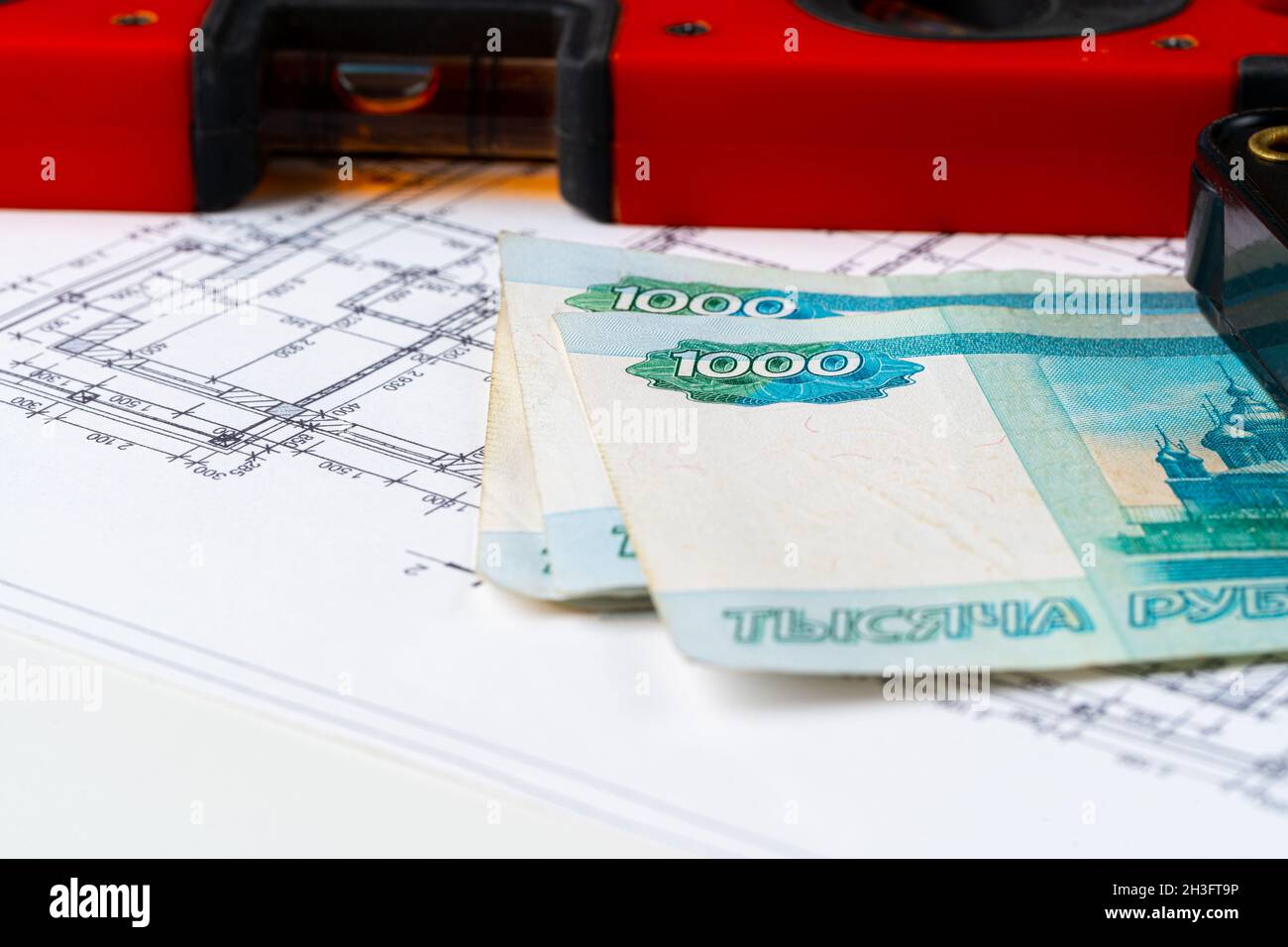 Architectural drawing and Russian Ruble money stack Stock Photo - Alamy