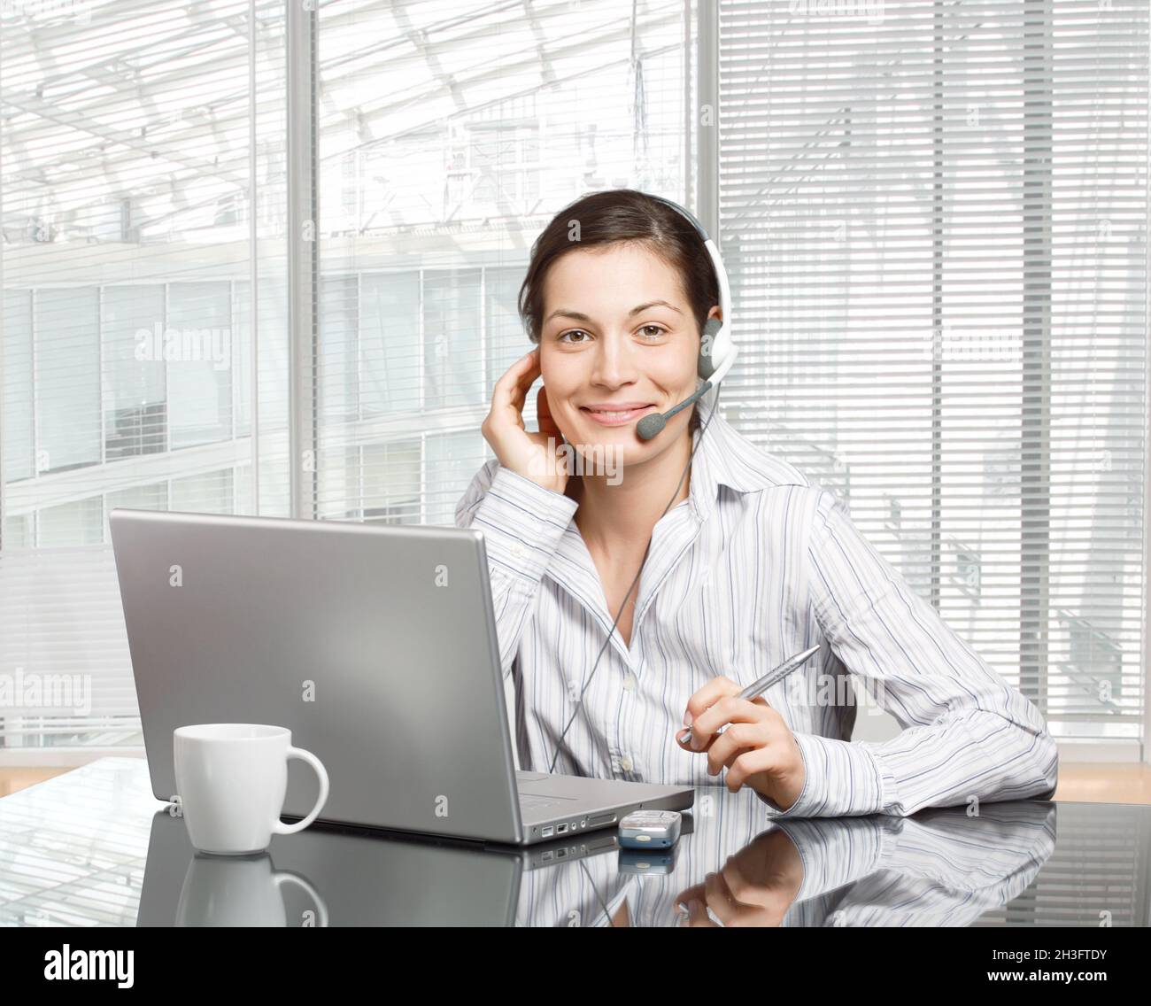 Operator in headset Stock Photo - Alamy