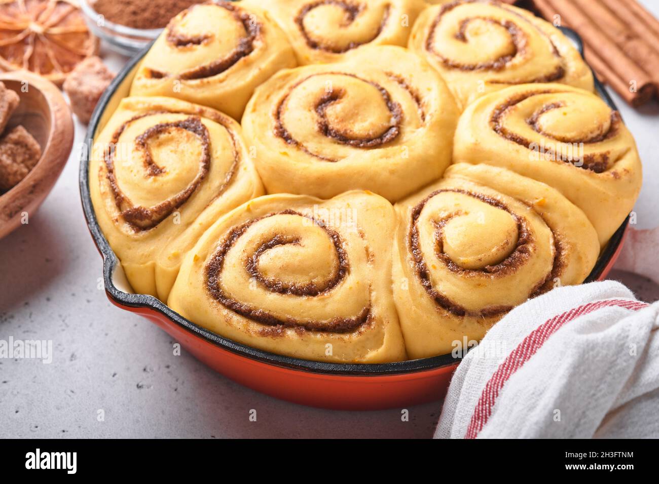 Cinnamon rolls or cinnabon homemade recipe raw dough preparation sweet ...