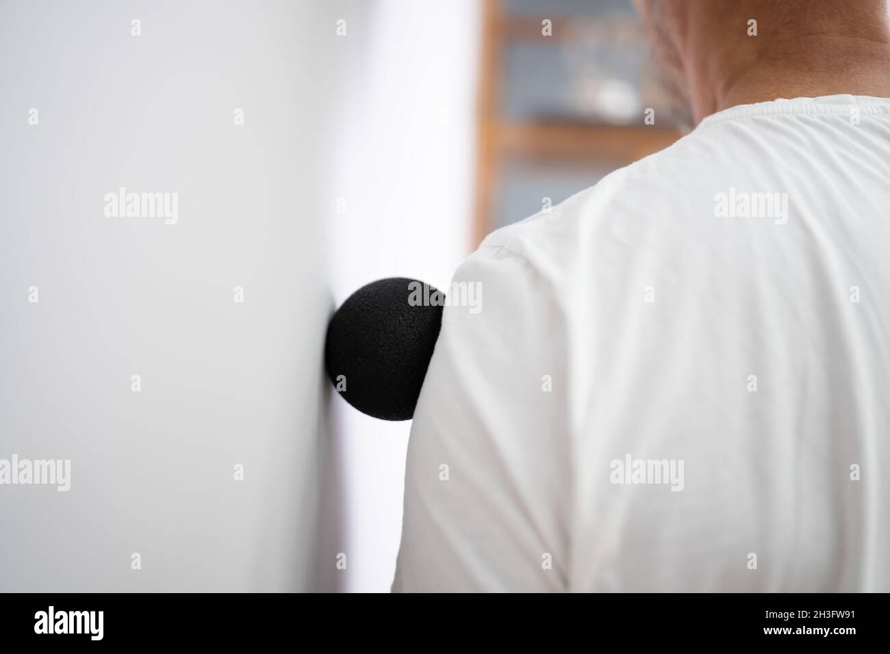 Back Trigger Point Massage Using Foam Ball Myofascial Release Stock ...