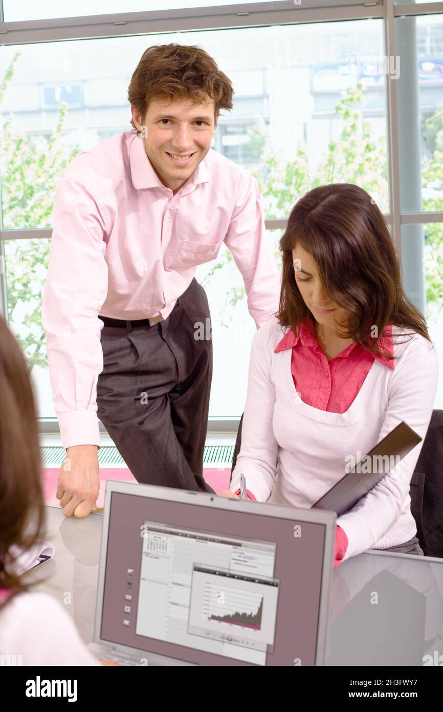Busy working together hi-res stock photography and images - Alamy