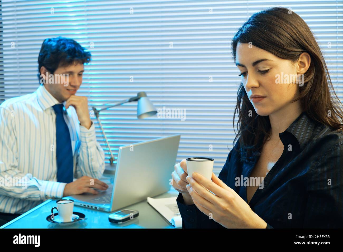 Working late at office Stock Photo - Alamy