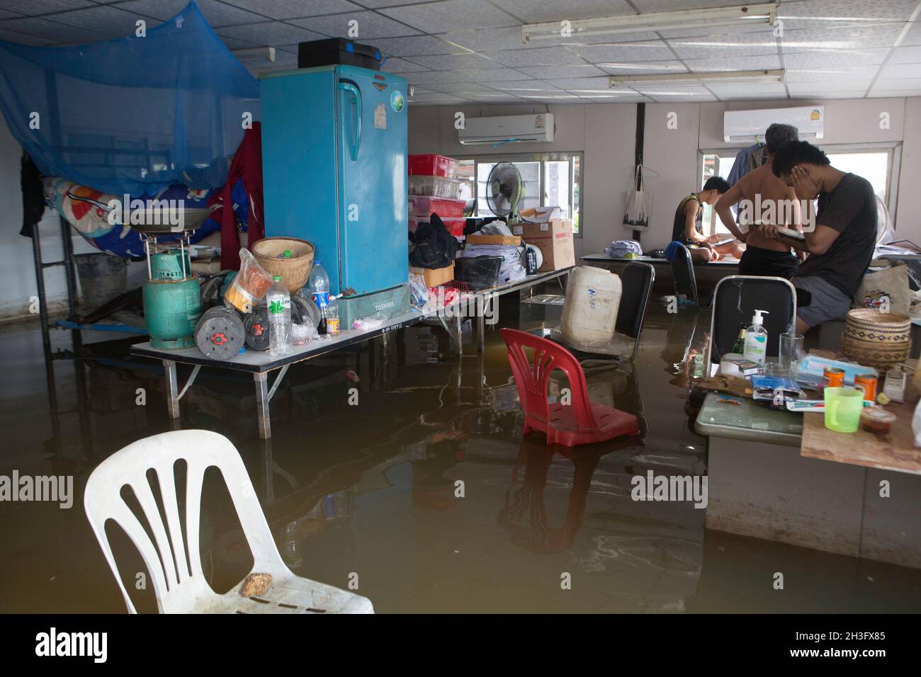 An office in a construction worker's camp has been flooded for months ...