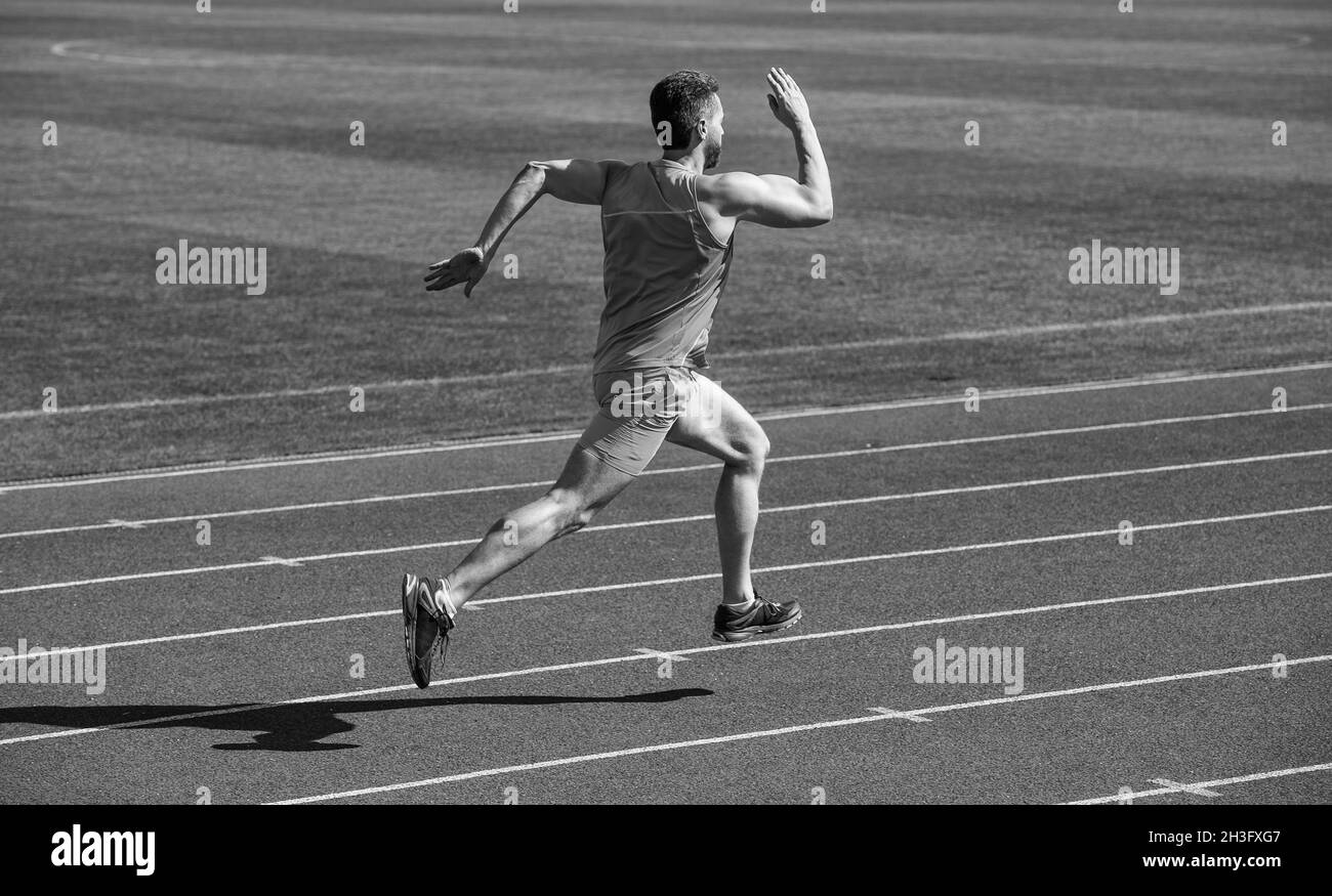 athlete runner do aerobic or anaerobic load. man start running on ...