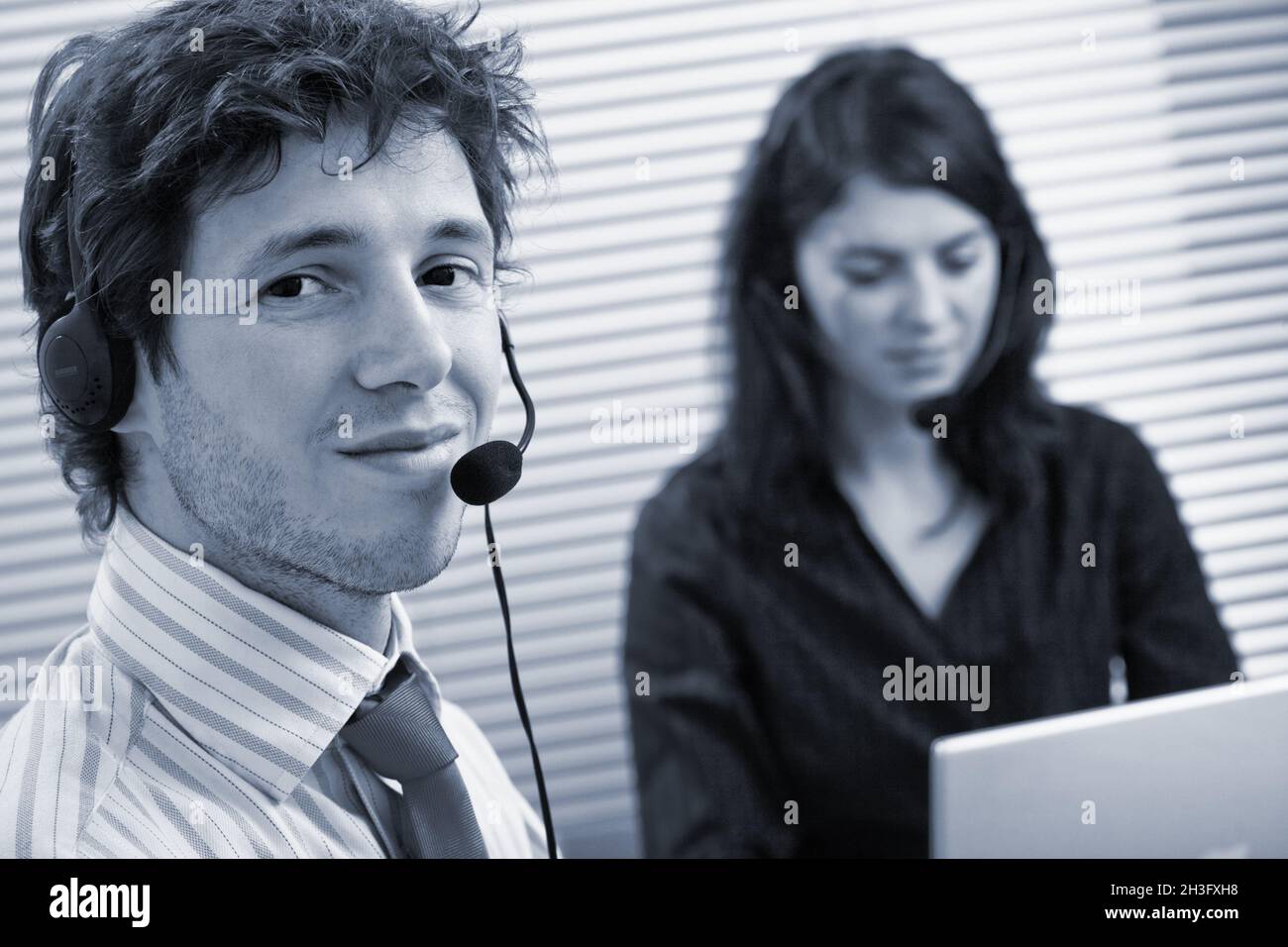 Business woman inside center talking hi-res stock photography and ...