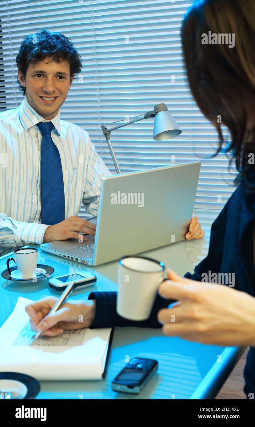 Businessman working late office reviewing hi-res stock photography and ...