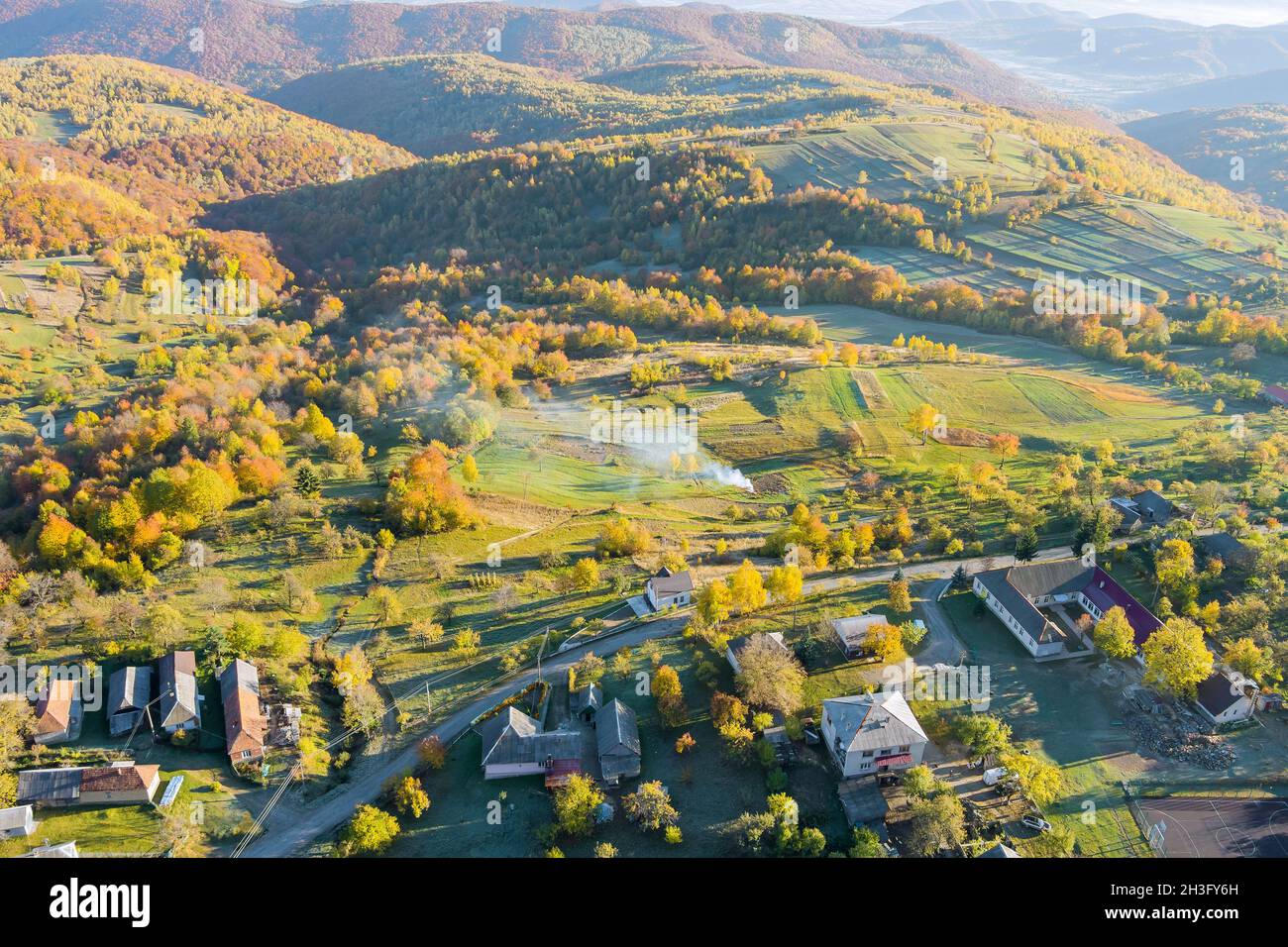 Aerial top view of the amazing countryside mountain scenery forest ...