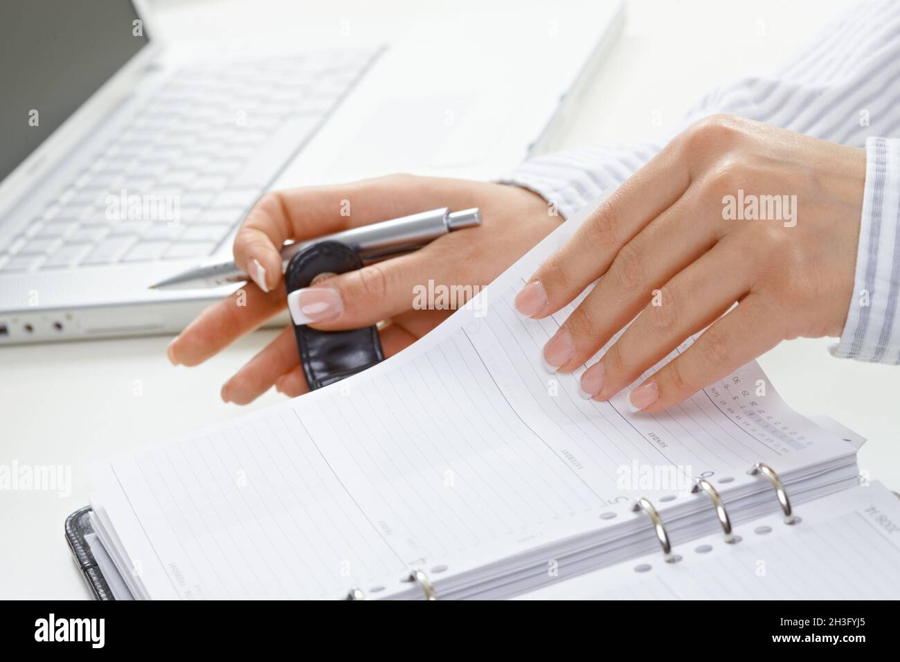 Fingers turning page hi-res stock photography and images - Alamy