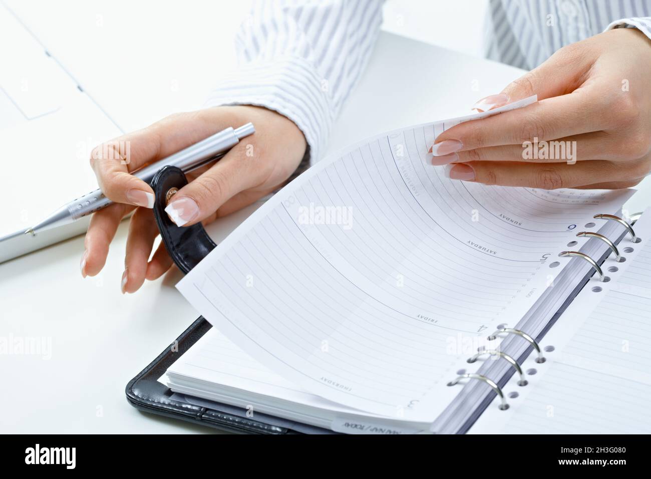 Turning the page hi-res stock photography and images - Alamy