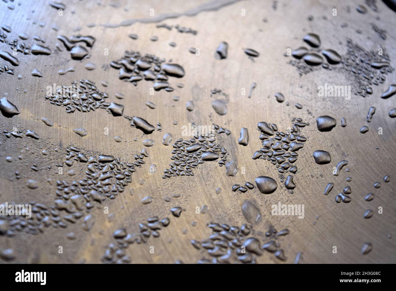 Closeup of water drops on a metal surface Stock Photo - Alamy