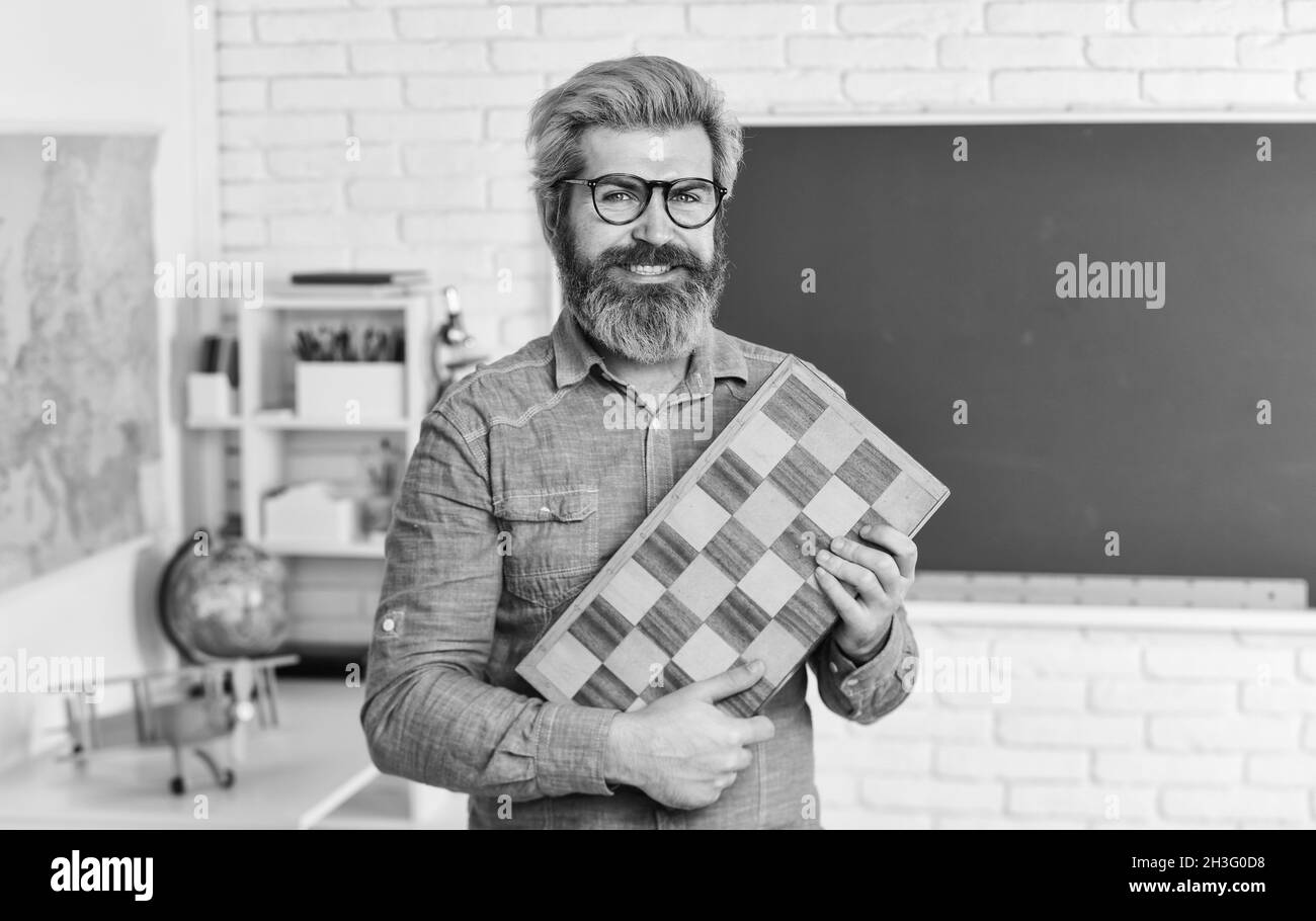 Management and leadership. Board game. Smart man playing chess ...