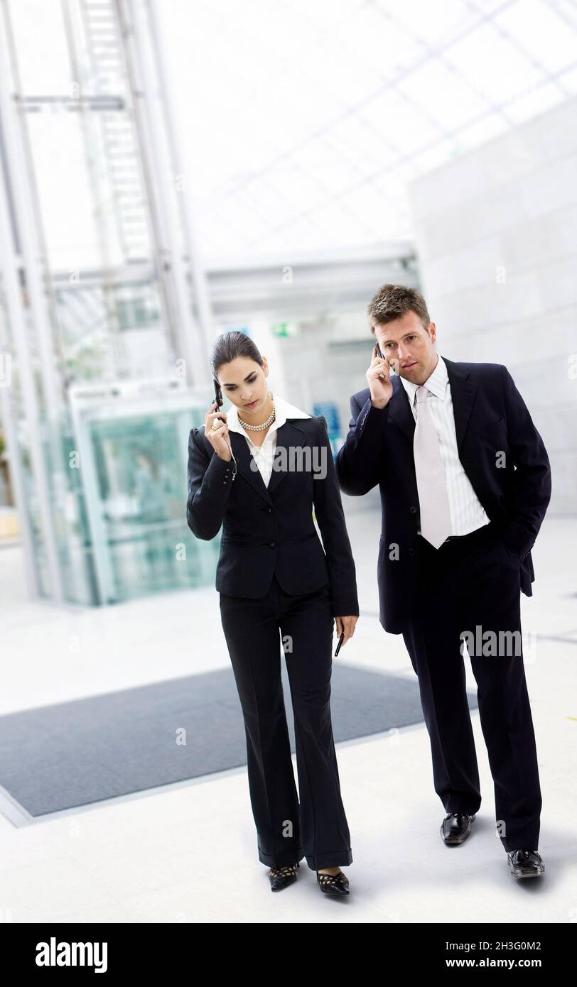 Busy business people Stock Photo - Alamy