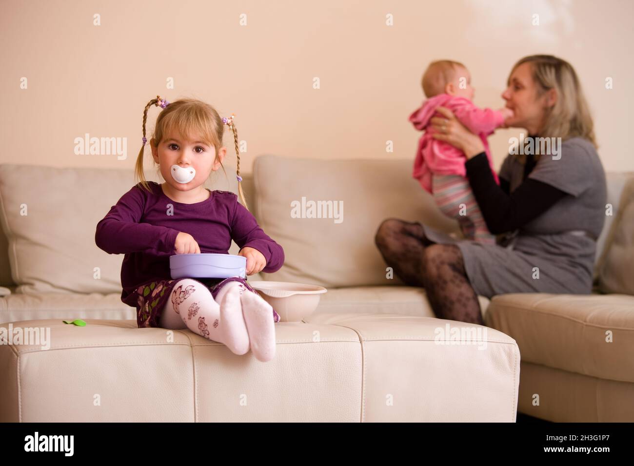 Little girl pacifier hi-res stock photography and images - Alamy