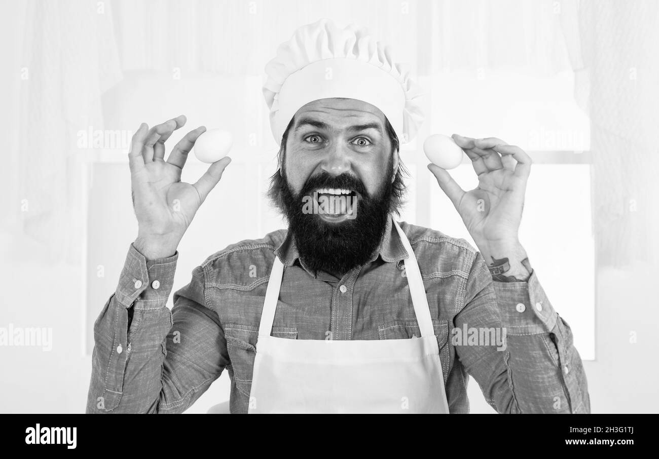 Man eating eggs not woman Black and White Stock Photos & Images - Alamy