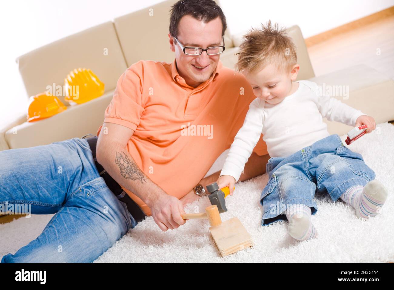 Father and baby boy playing Stock Photo - Alamy