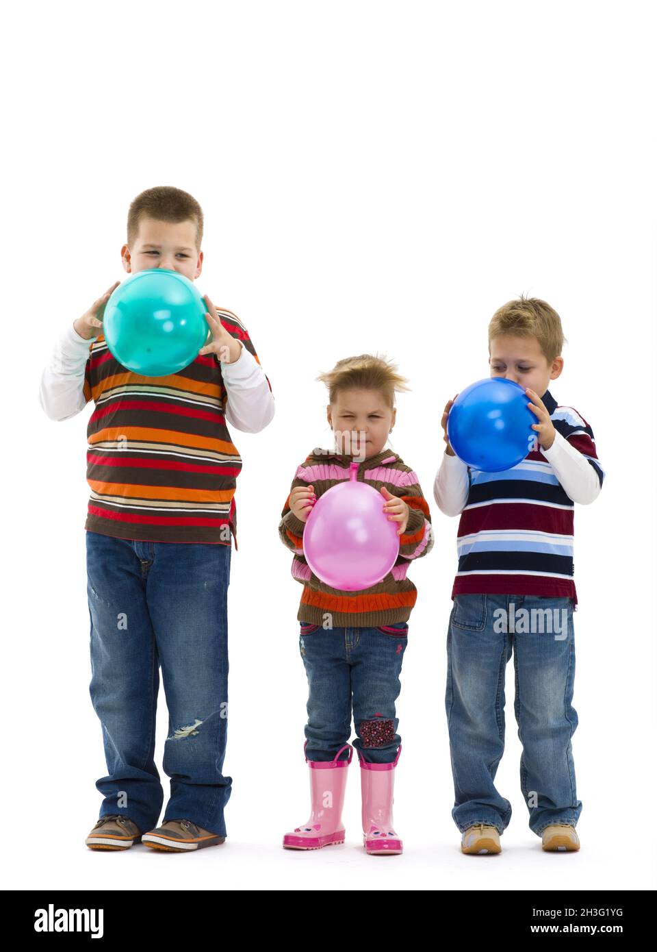 Children blowing up toy balloons Stock Photo - Alamy