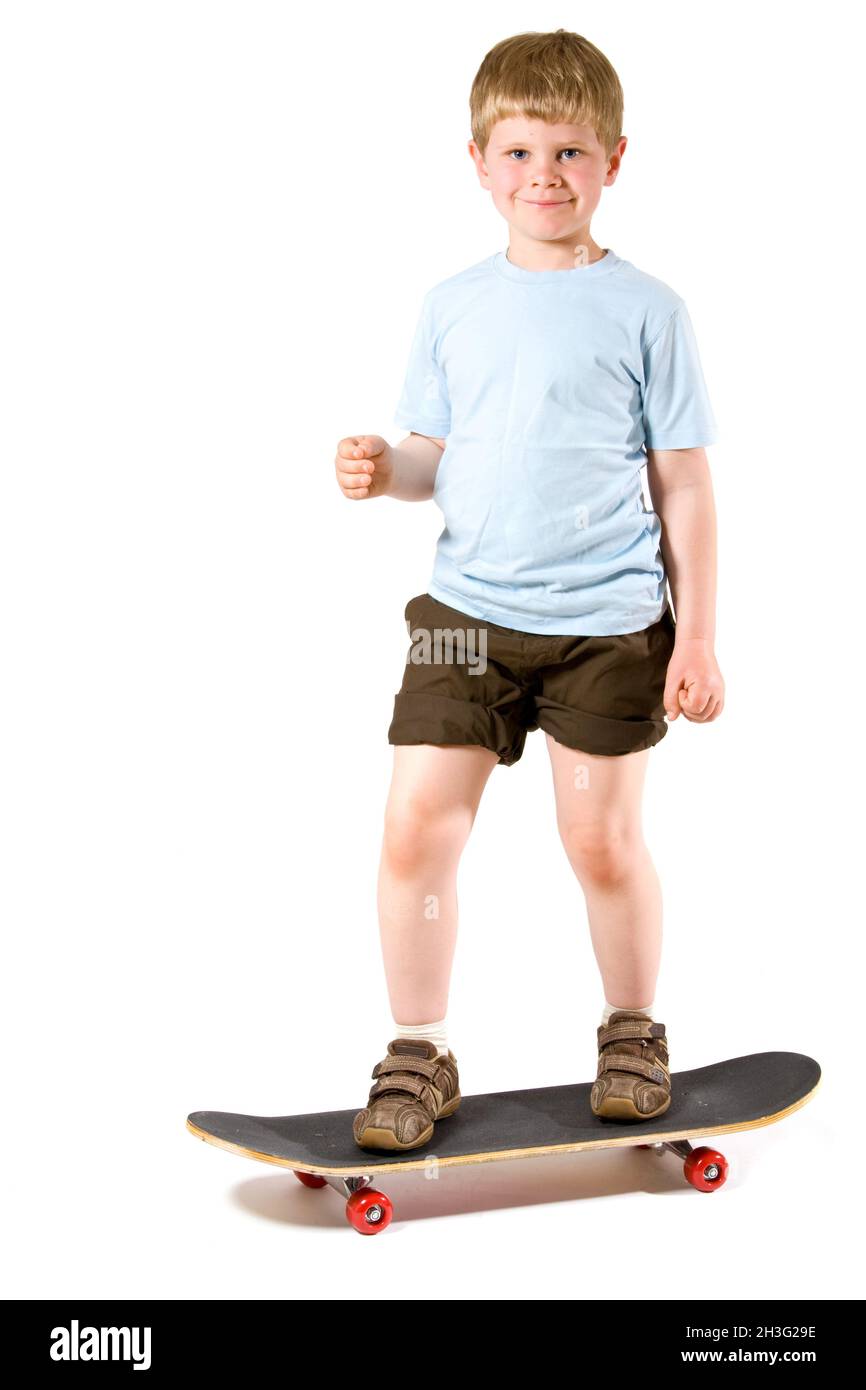 Boy with skateboard Stock Photo - Alamy