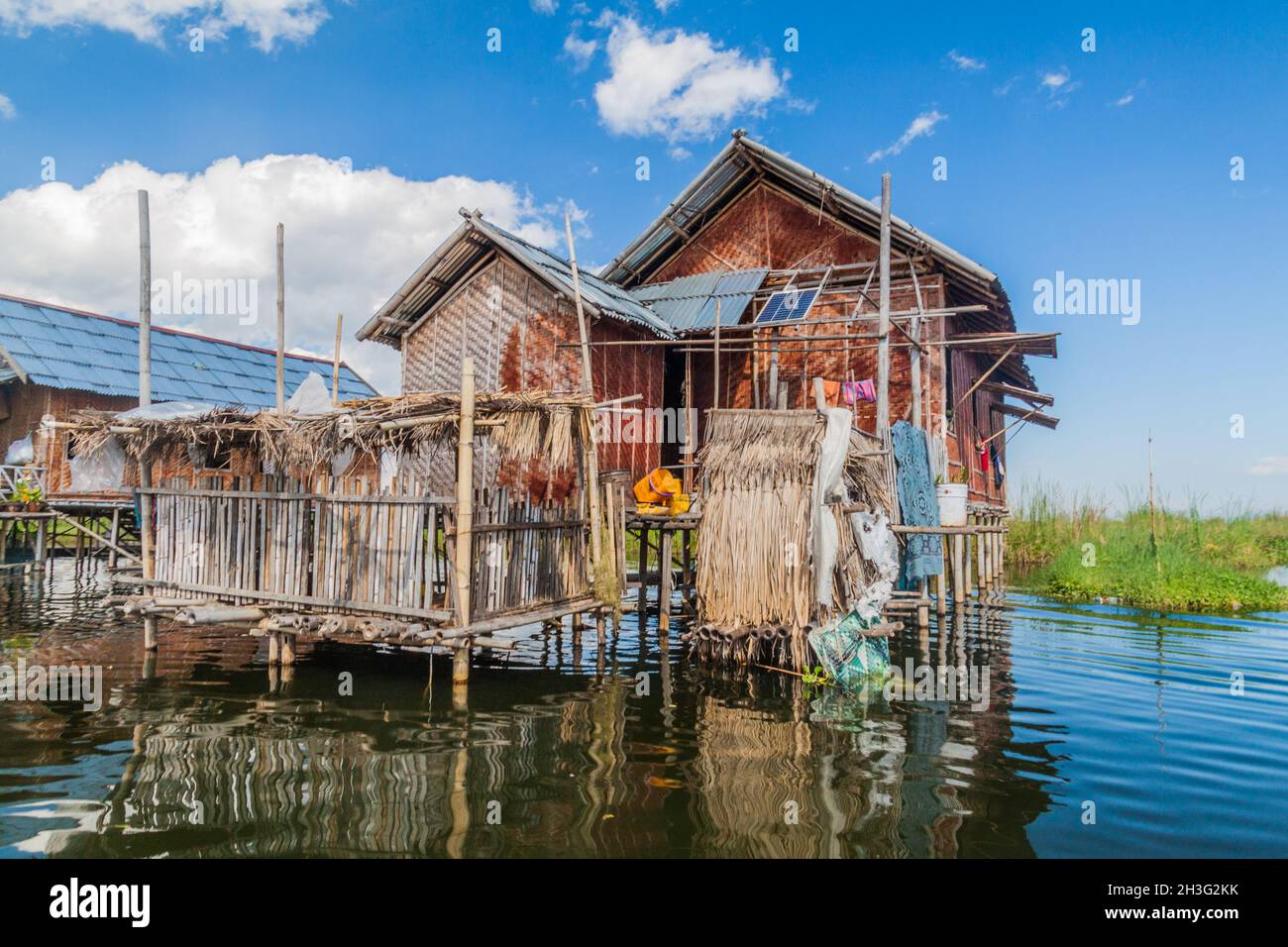Stilt houses of Inn Paw Khone village at Inle lake, Myanmar Stock Photo ...