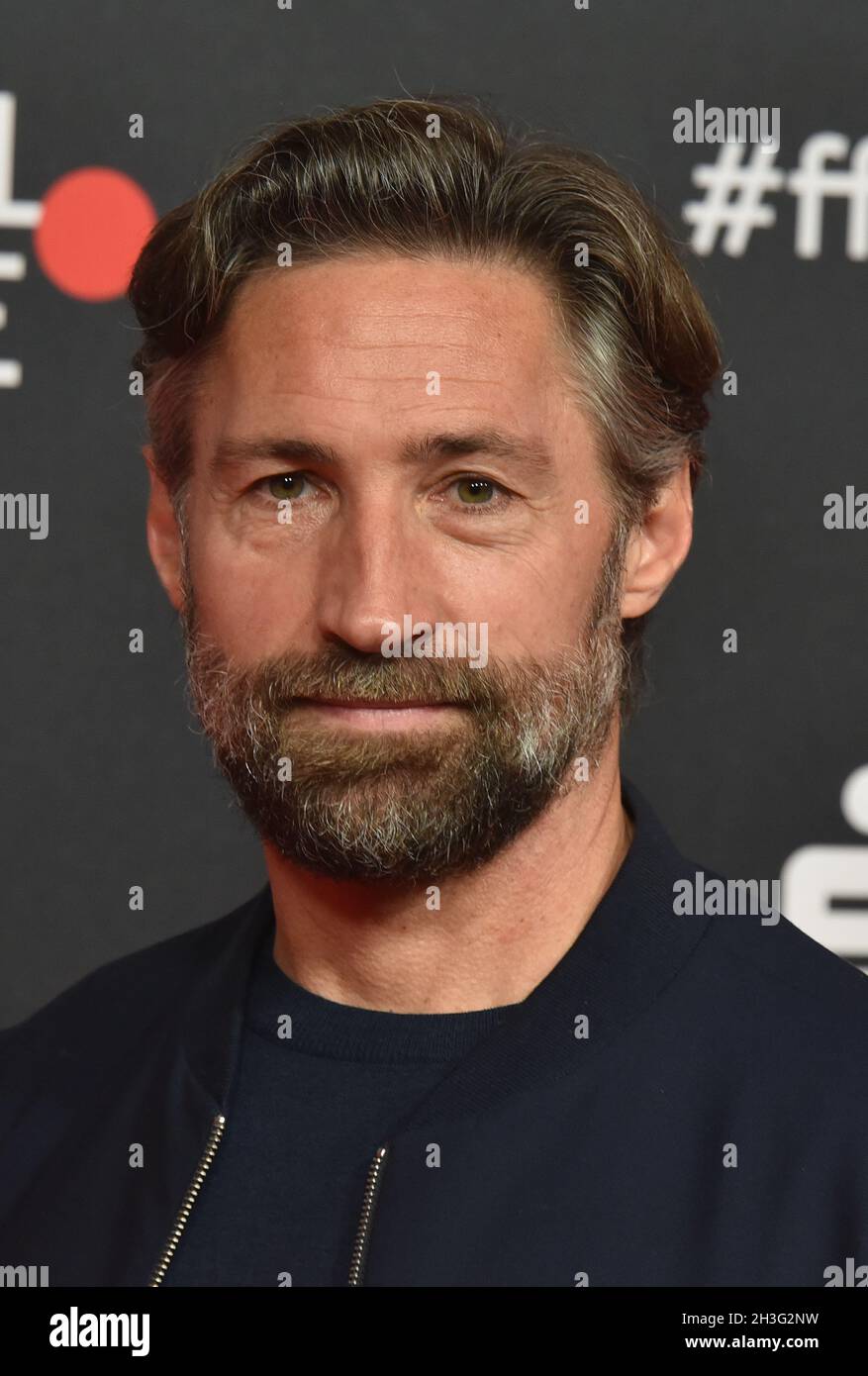 Cologne, Germany. 26th Oct, 2021. Actor Benjamin Sadler arrives for the ...