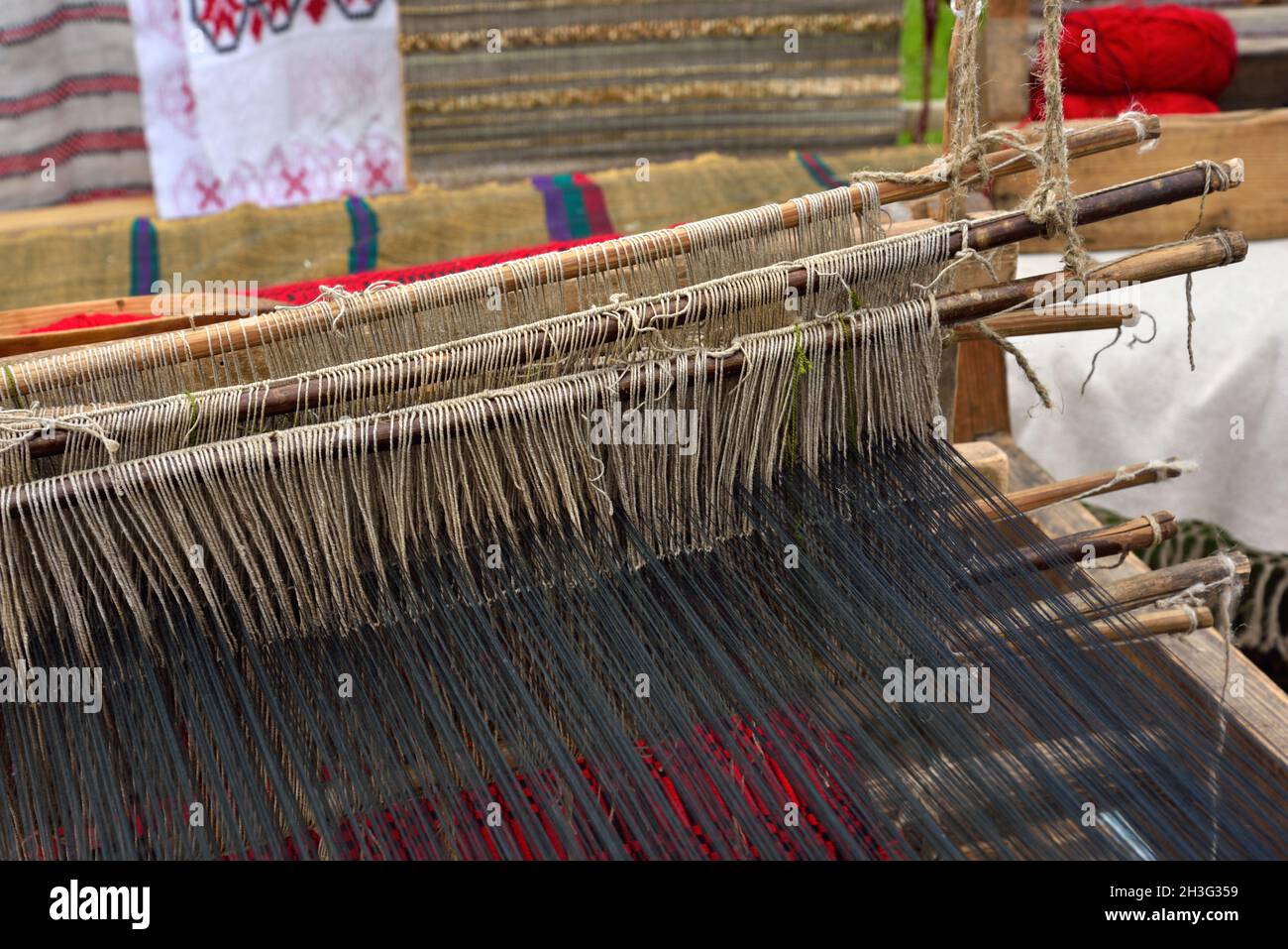 Part of traditional vintage belorussian weaving hand loom with wool ...